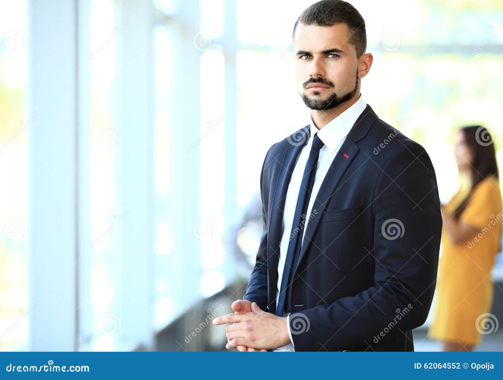 Image of Smart Young Businessmen Looking at Camera Stock Photo - Image ...