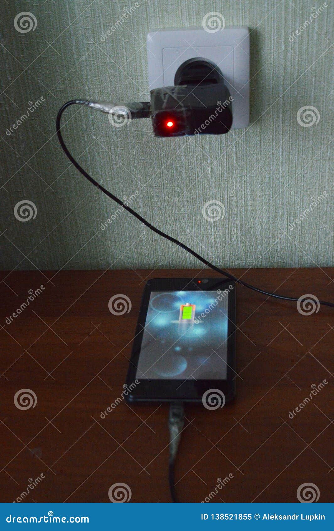Charging the Smartphone from the Mains. Stock Image - Image of charging ...