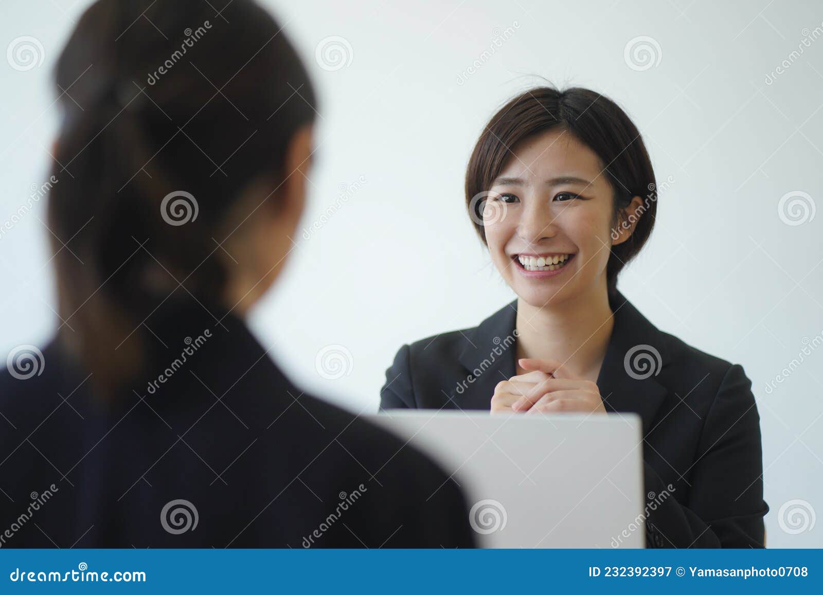 Image of a Smiling Female Employee Stock Image - Image of suit ...