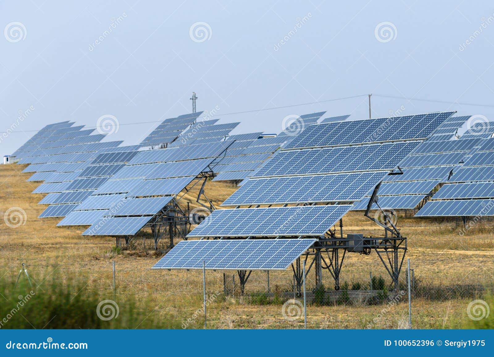 Solar panels on the field stock photo. Image of blue - 100652396