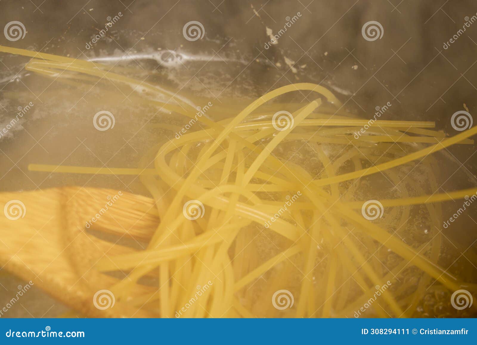 Spaghetti in boiling water stock image. Image of stainless - 308294111