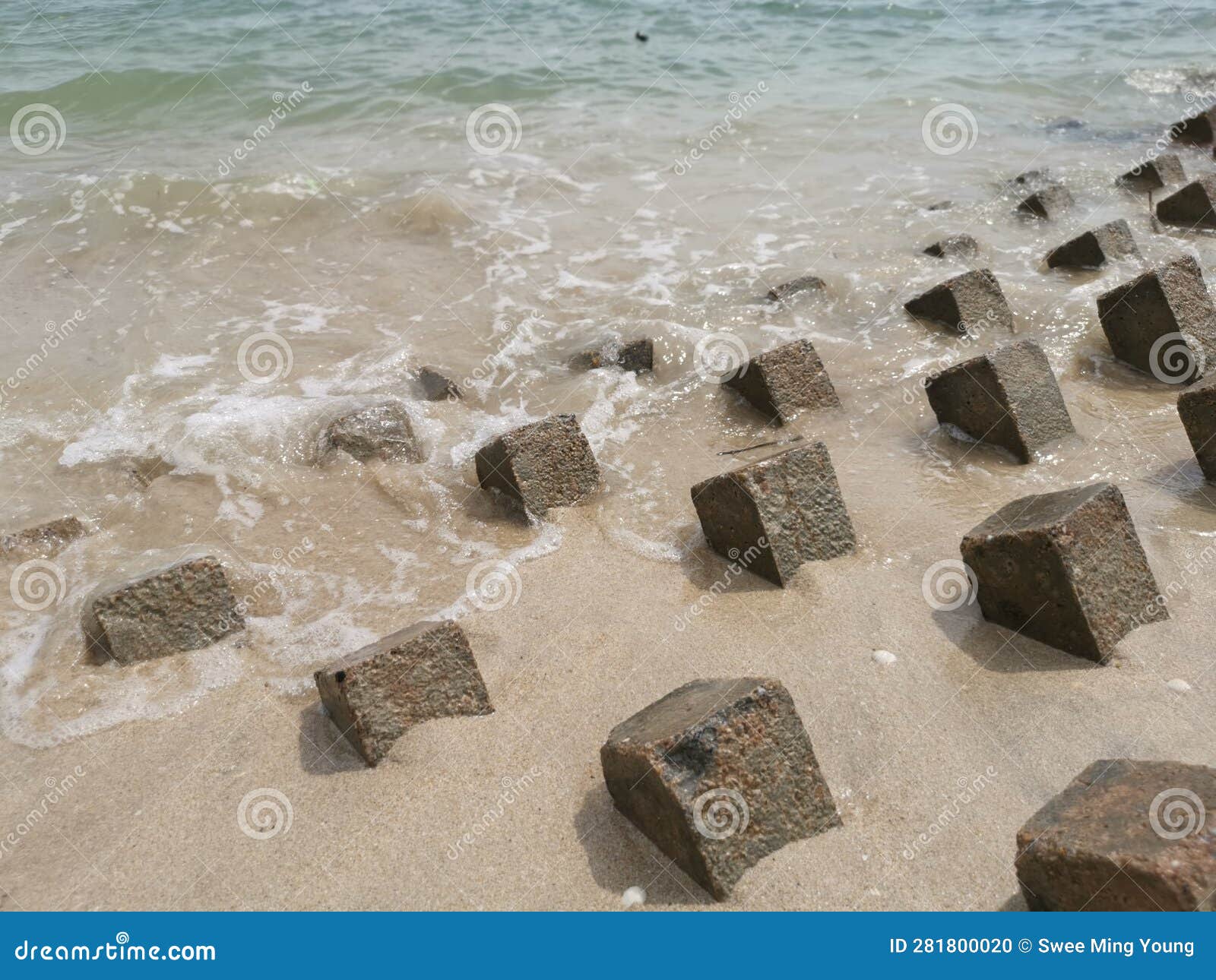Square-shaped Concrete Coastal Wave Blocker by the Seaside Stock Photo ...