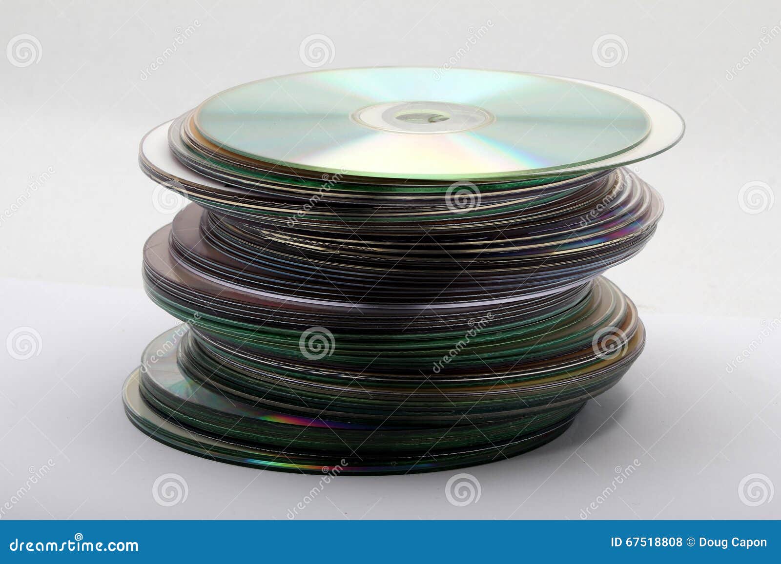 Image of a Stack of DVDs and CDs Taken from a Sideways View Stock Photo ...