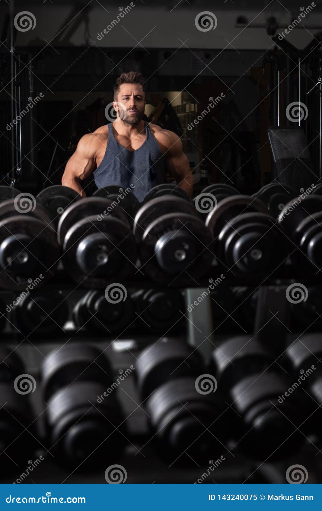 A strong male bodybuilder stock image. Image of body - 143240075