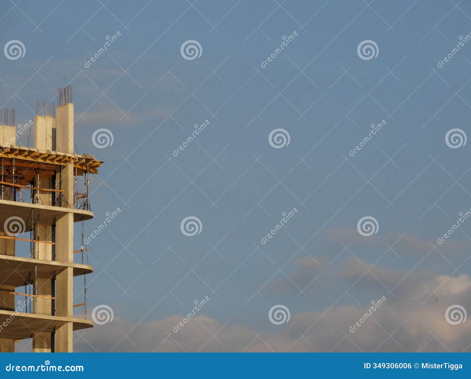 Image of a Sunny Construction Site, Featuring a Buildings Skeletal ...