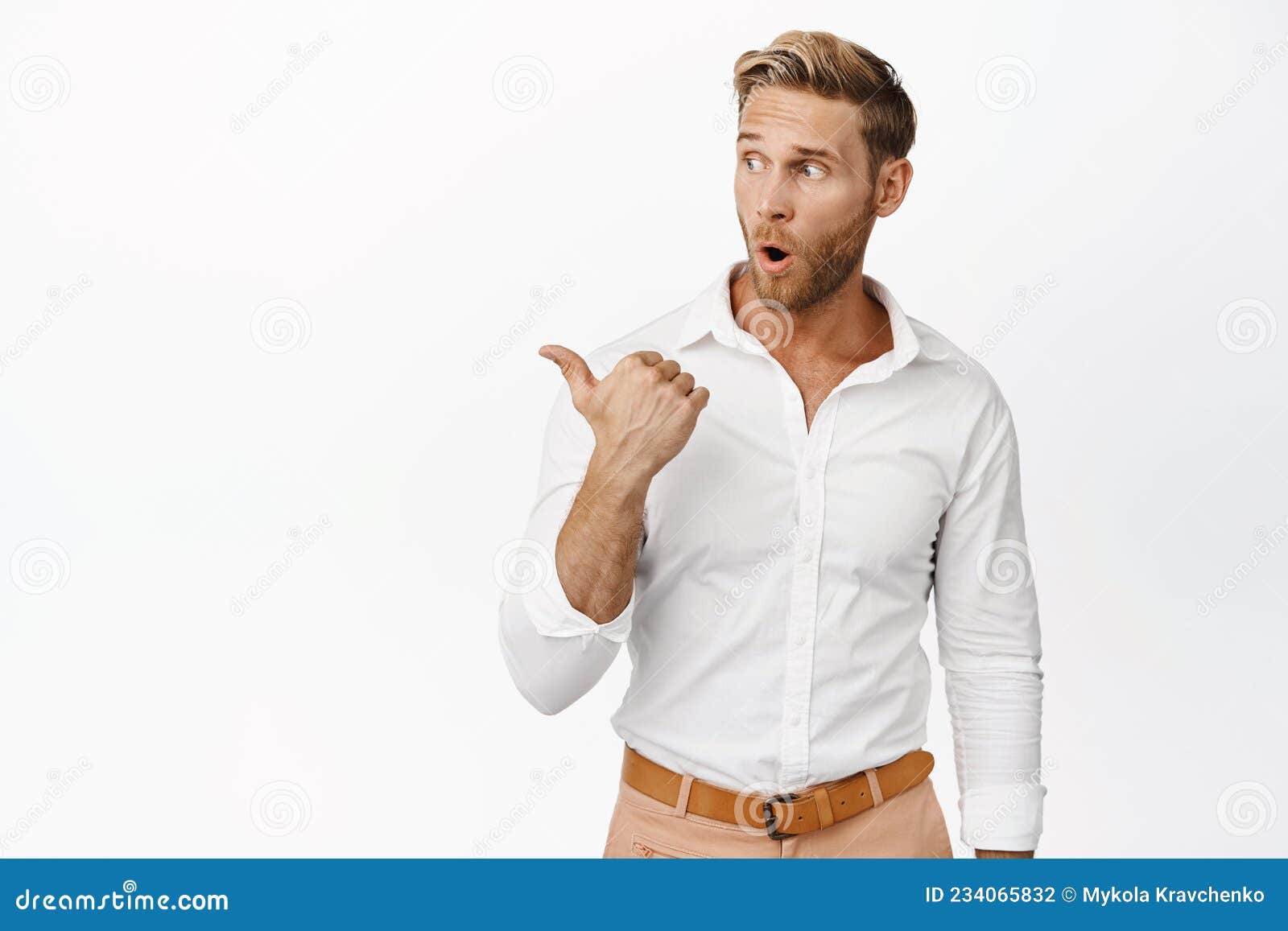 Image of Surprised Blond Guy, Pointing and Looking Left at ...