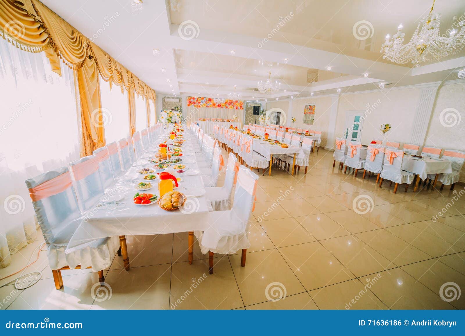 Image of Tables Setting in Orange Colour at a Luxury Wedding Hall Stock ...
