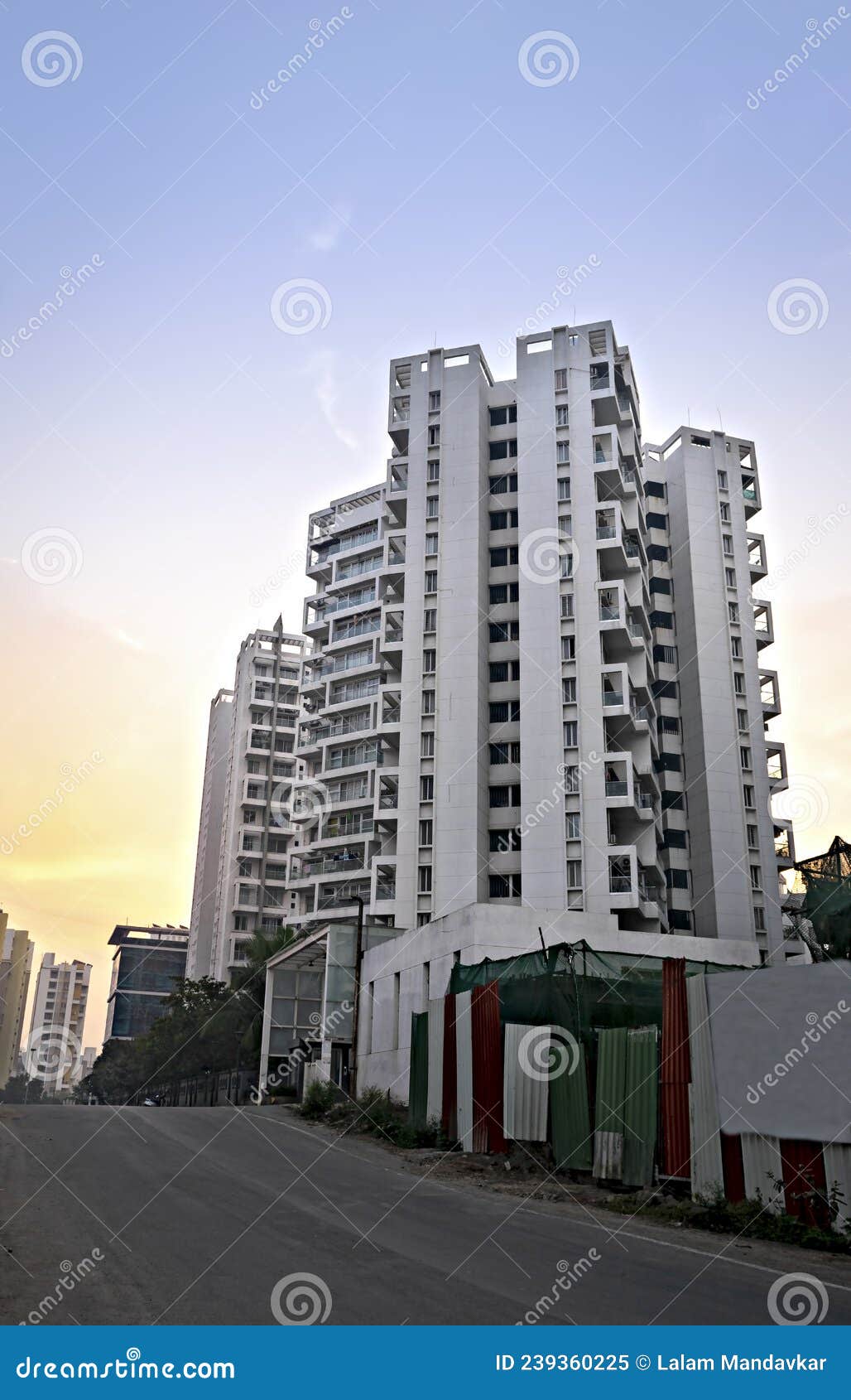 Image of Tall Buildings Under Construction with Blue Sky Background in ...