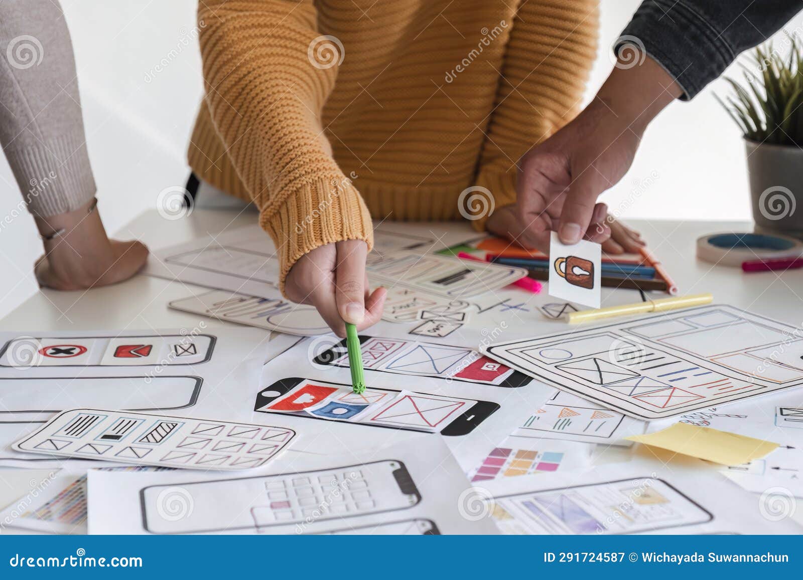 Image of a Team of Developers Brainstorming UI and UX Design Ideas for ...