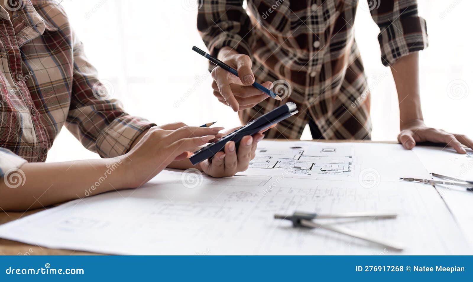 Image of Team Engineer and Architect Discuss for Construction ...