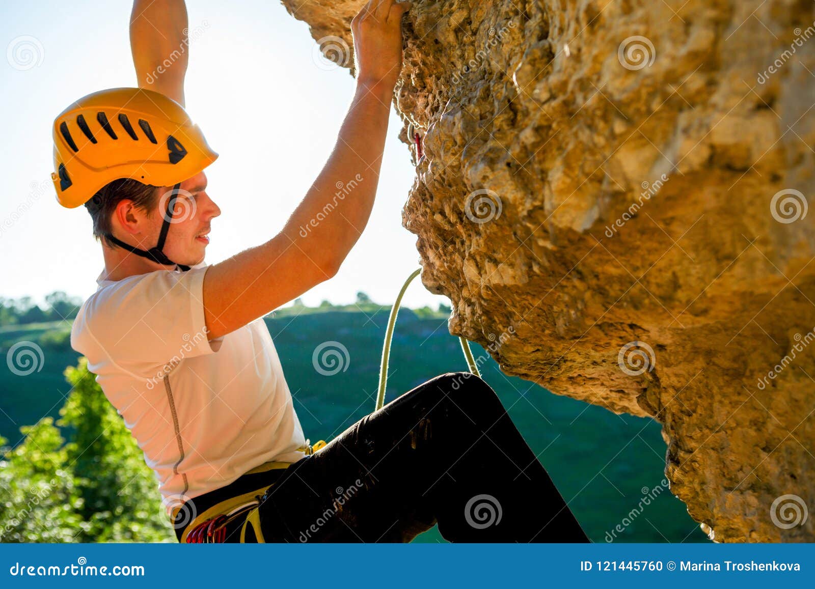 Image of Tourist Man in Helmet Clambering Up Stock Photo - Image of ...
