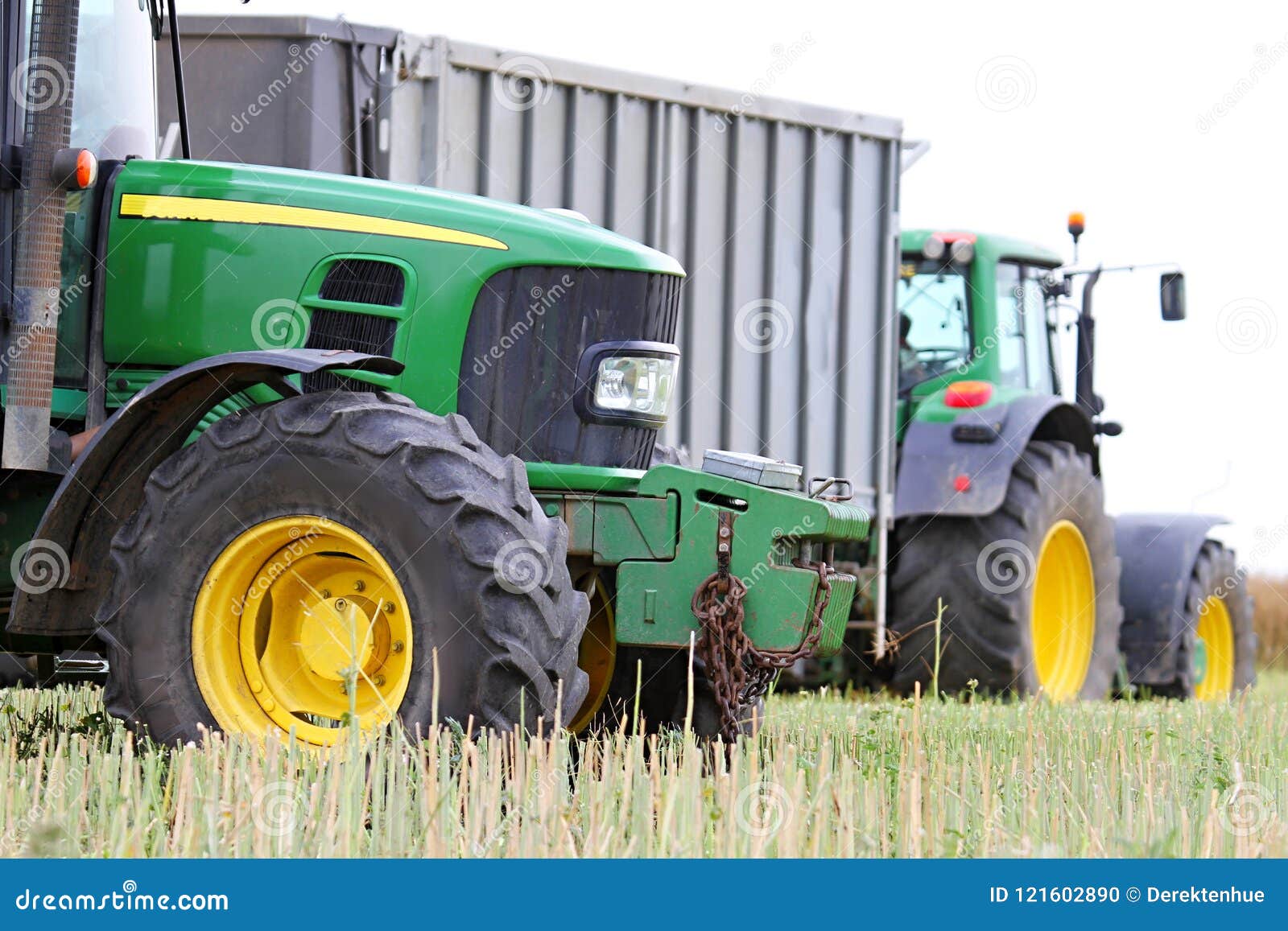 Tractor Working in a Field during Harvesting Editorial Image - Image of ...
