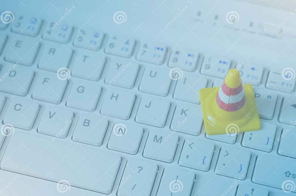 The Image of a Traffic Cone on a Keyboard Suggests Potential System ...