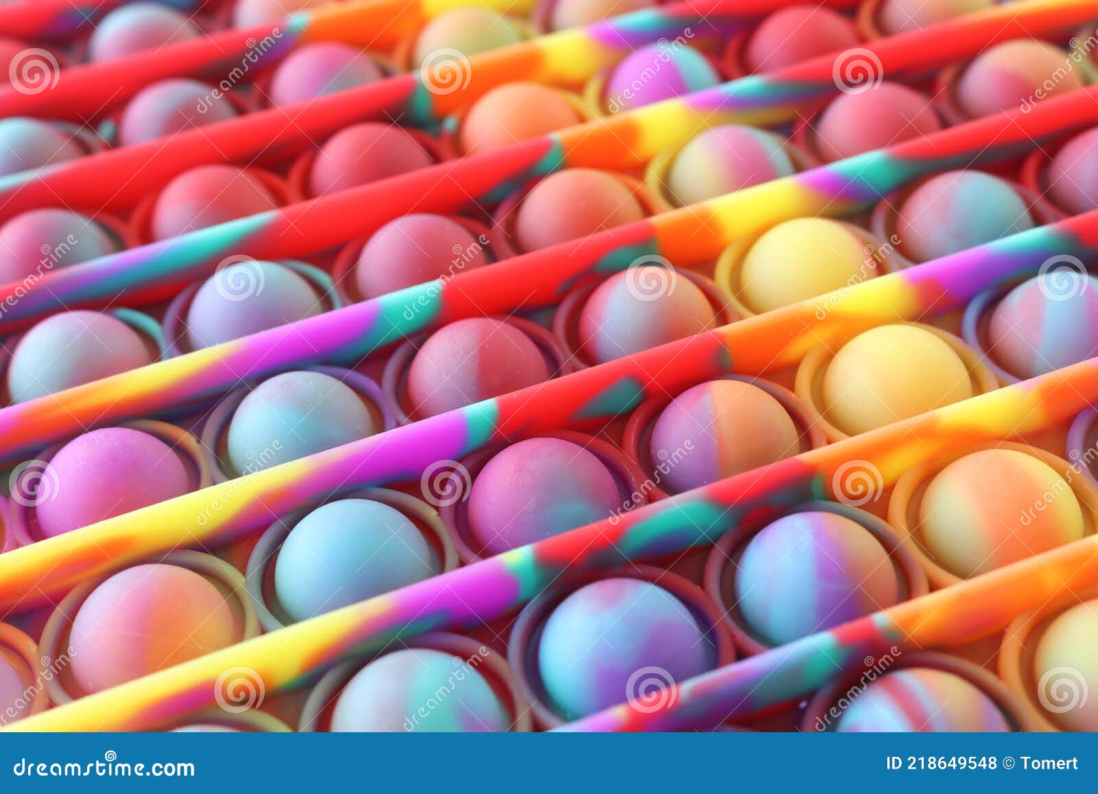 Image of Trendy Colorful Pop it Fidget Toy Background Stock Photo ...