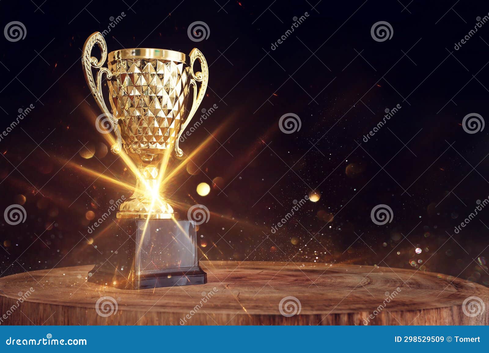 Image of Trophy Over Wooden Table and Dark Background, with Abstract ...