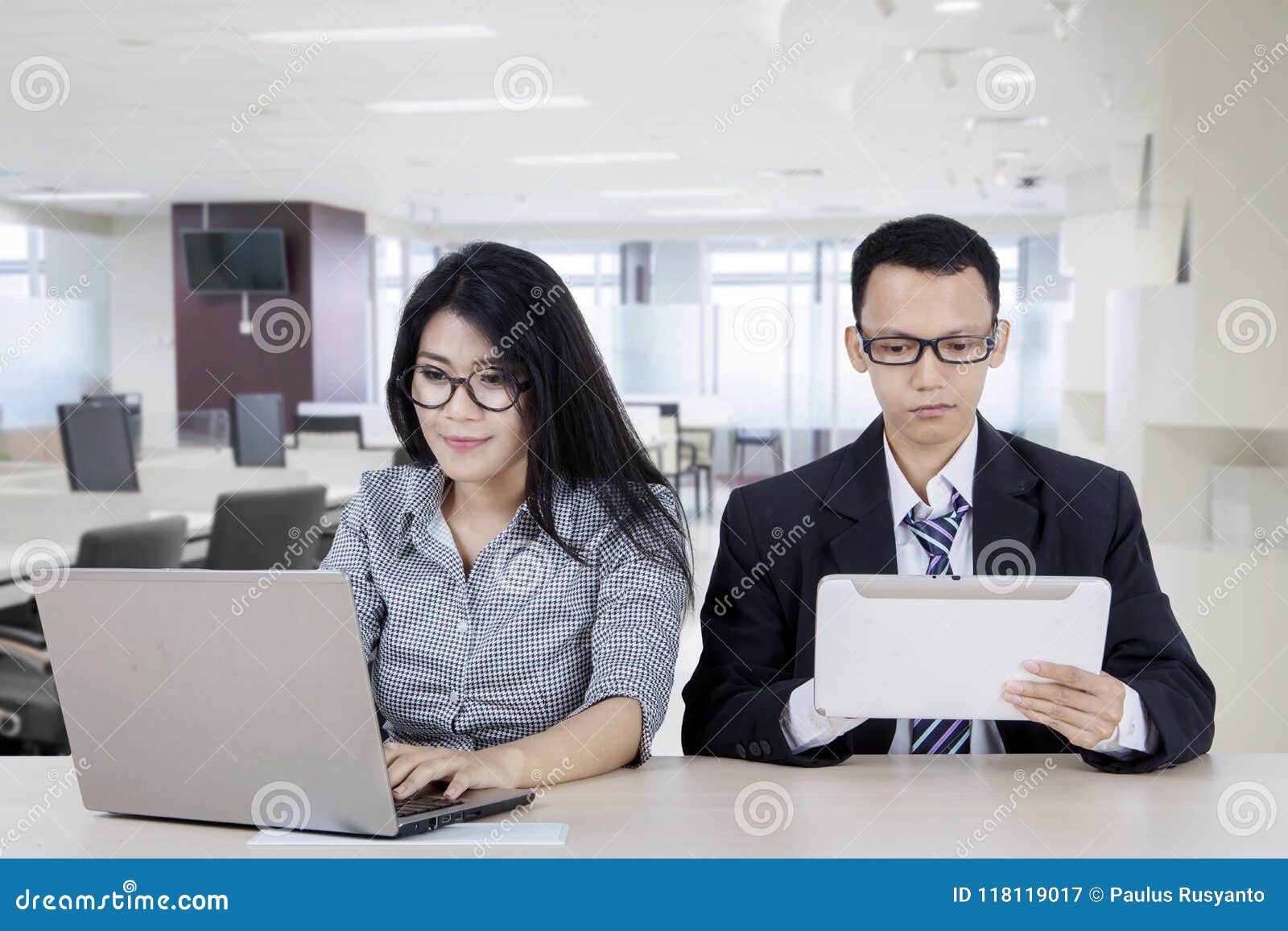 Two Business People Using Digital Device Stock Image - Image of indian ...