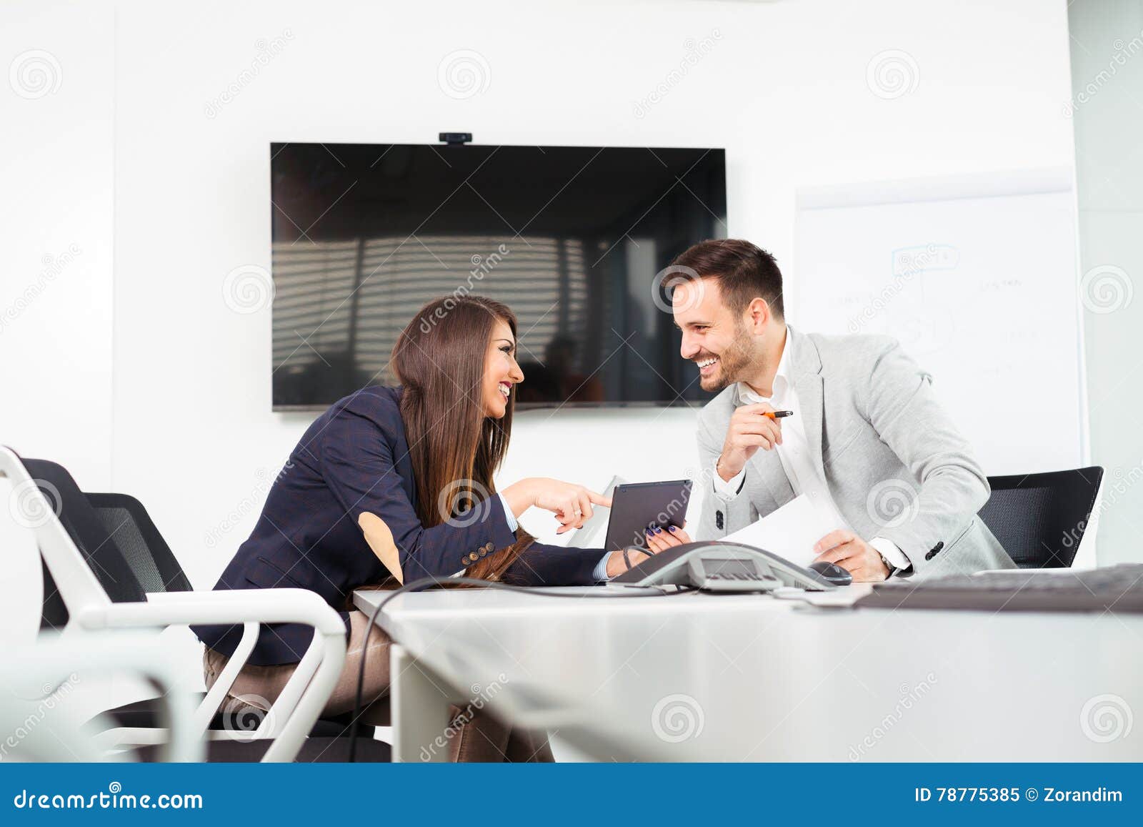 Image of Two Successful Business Partners Working at Meeting in Office ...