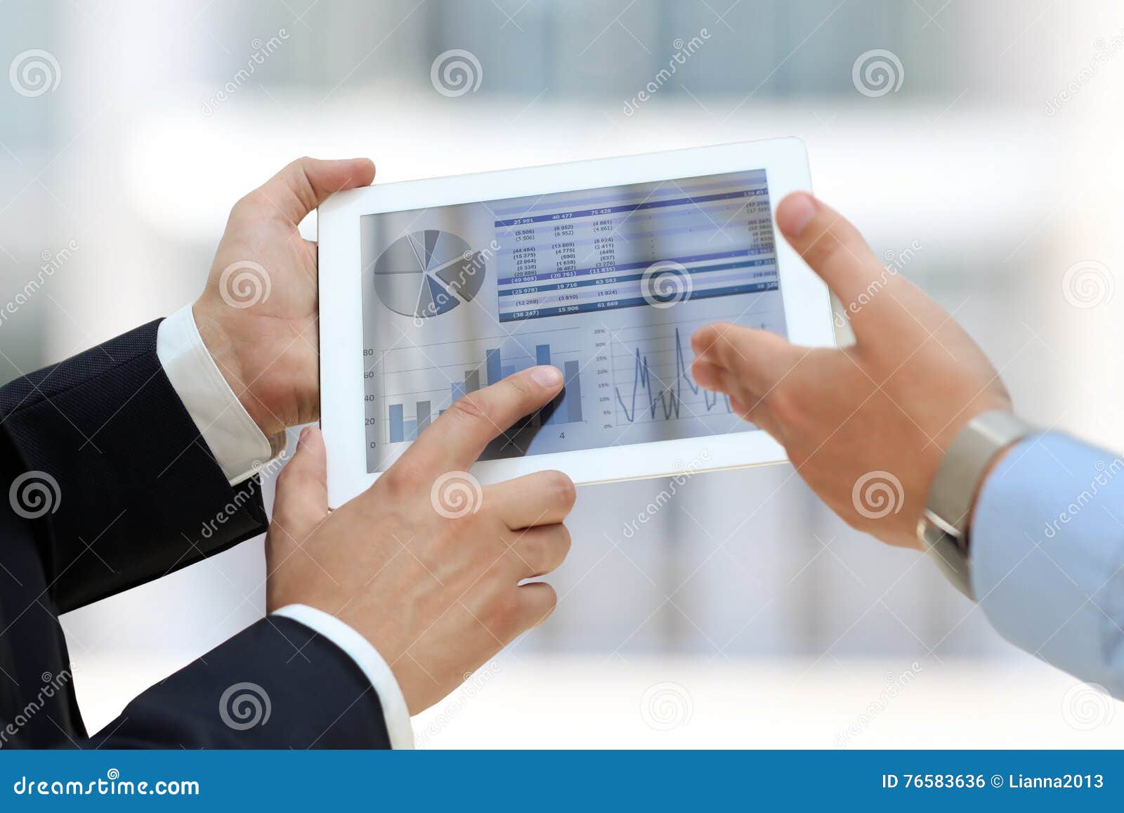 Image of Two Young Businessmen Using Touchpad Stock Photo - Image of ...
