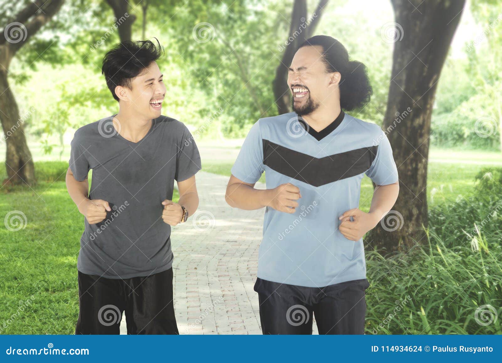 Two Men Doing Jogging Together in the Park Stock Photo - Image of ...