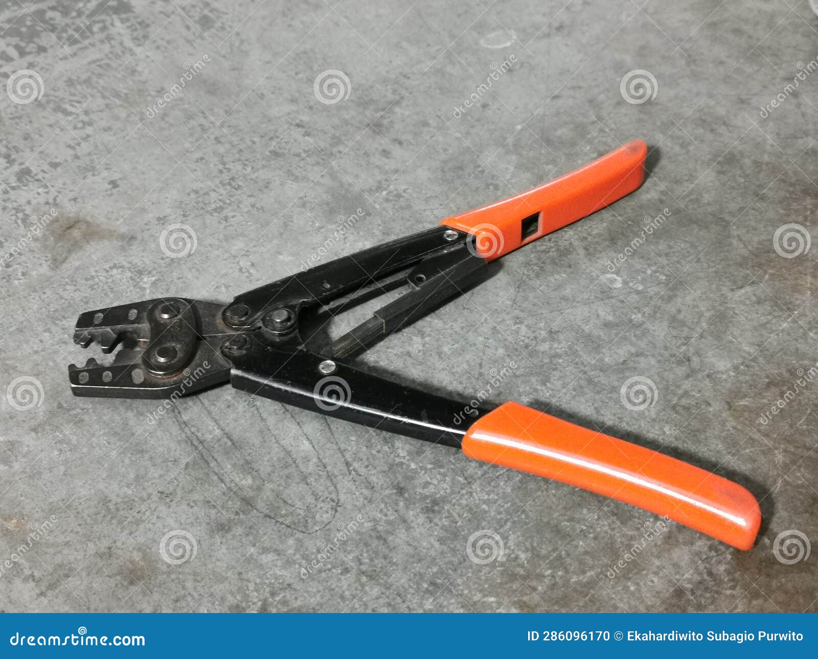 Image of Used and Rusty Crimping Tool on the Table. Stock Photo - Image ...
