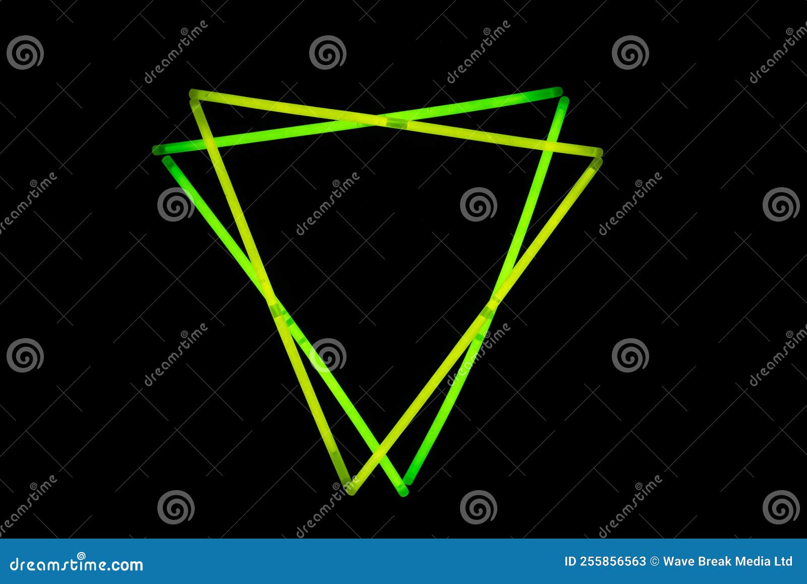 Image of Vibrant Triangles Green Neon Glow Sticks Over Black Background ...