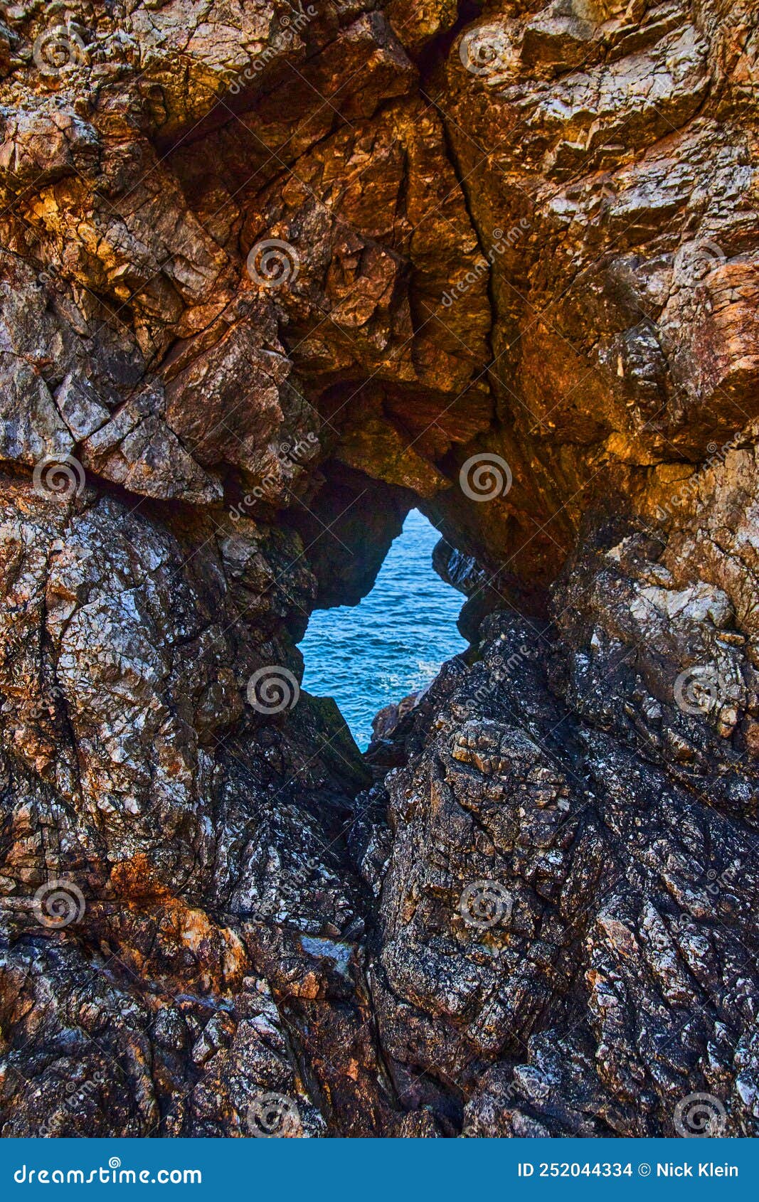 View through Rock Cave of Ocean Stock Photo - Image of rocks ...