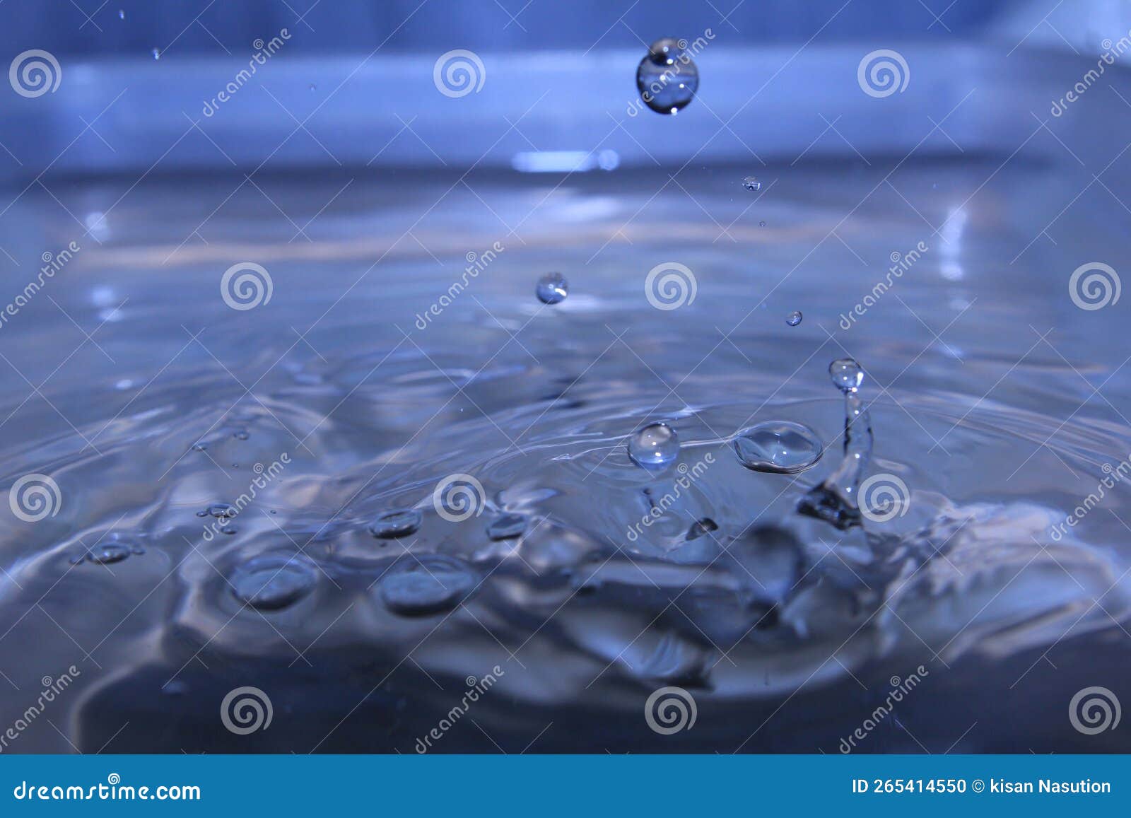 Image of a Water Drop in a Glass Stock Photo - Image of drop, glass ...
