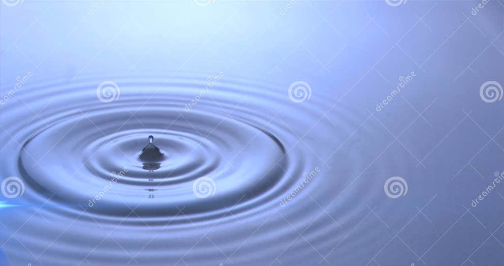 Image of Water Drops Dropping into Blue Water with Glowing Light Stock ...