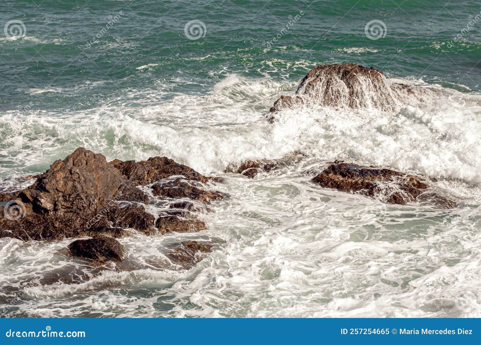 Image of Water Falling on a Rock after a Wave Has Crashed Against it ...