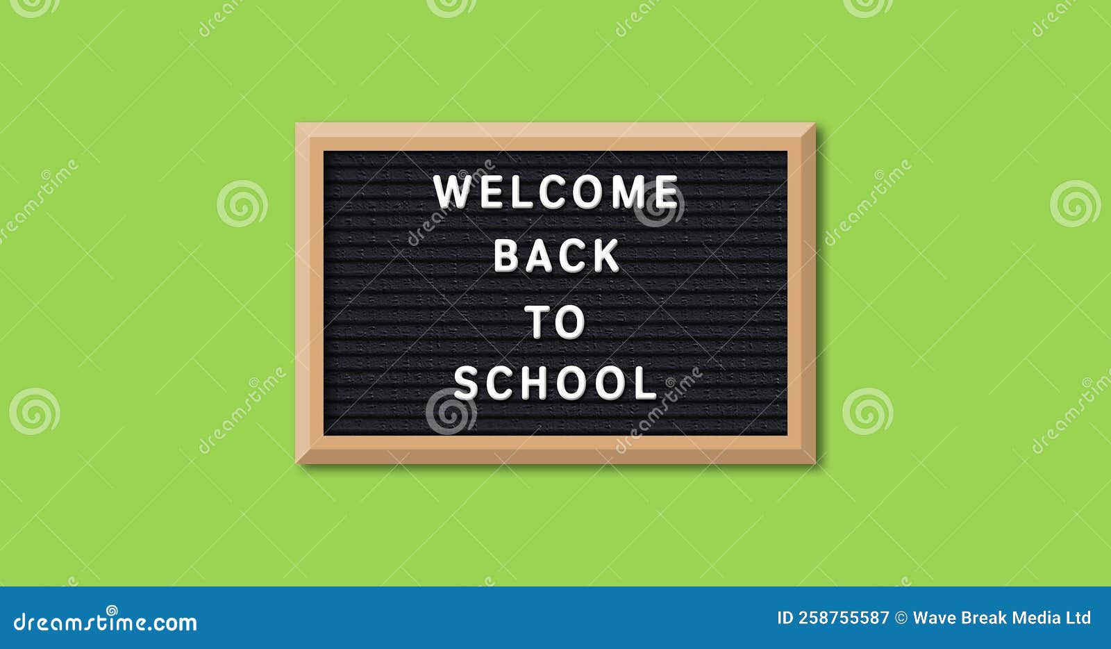 Image of Welcome Back To School on Board Over Green Background Stock ...