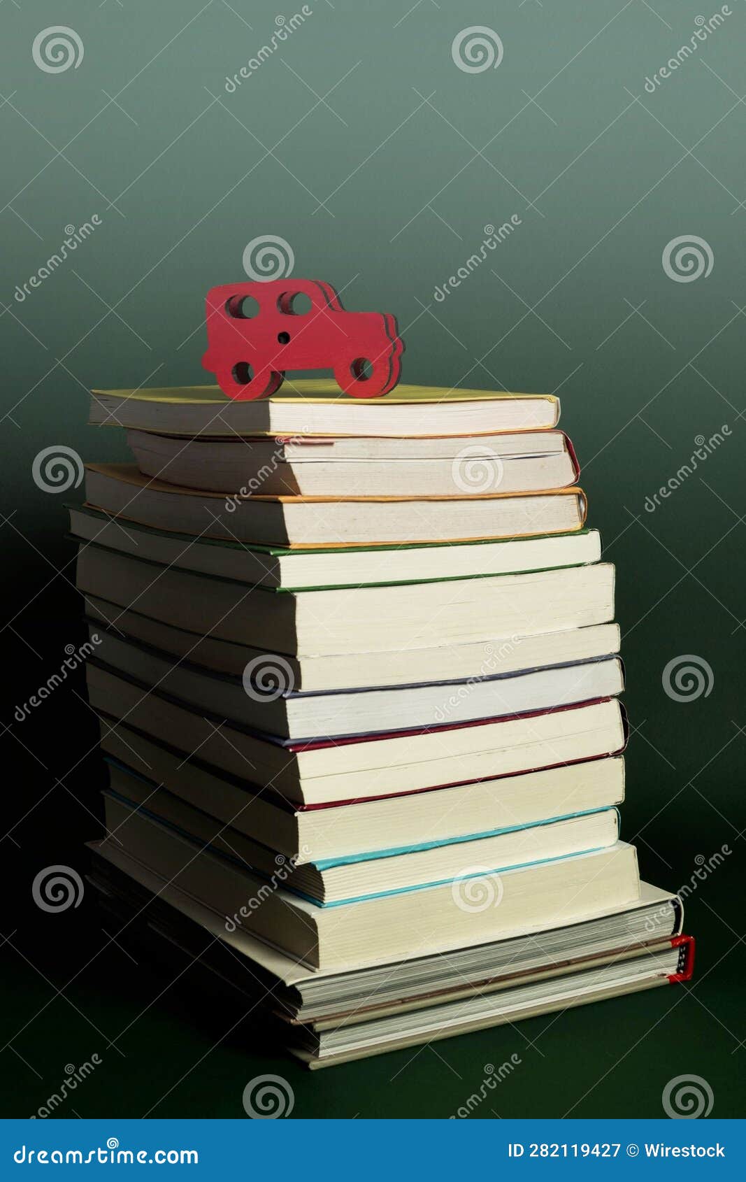 A Car Made Out of Paper on Top of a Stack of Books Stock Image - Image ...