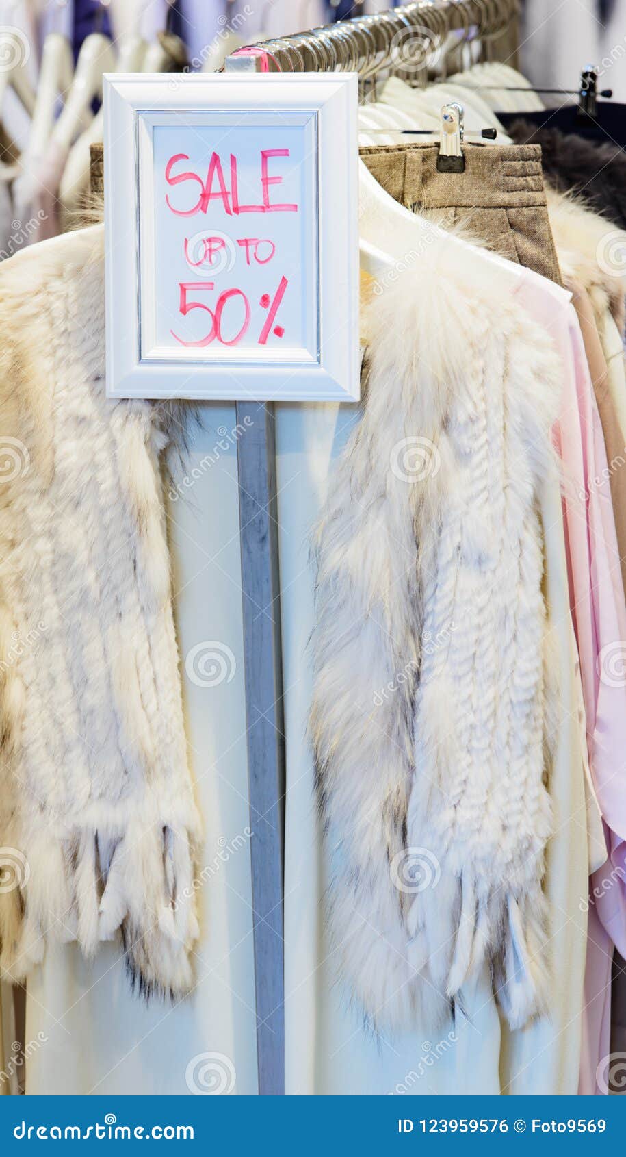 Image Winter Coat Hanging on the Rack in the Store Stock Photo - Image ...