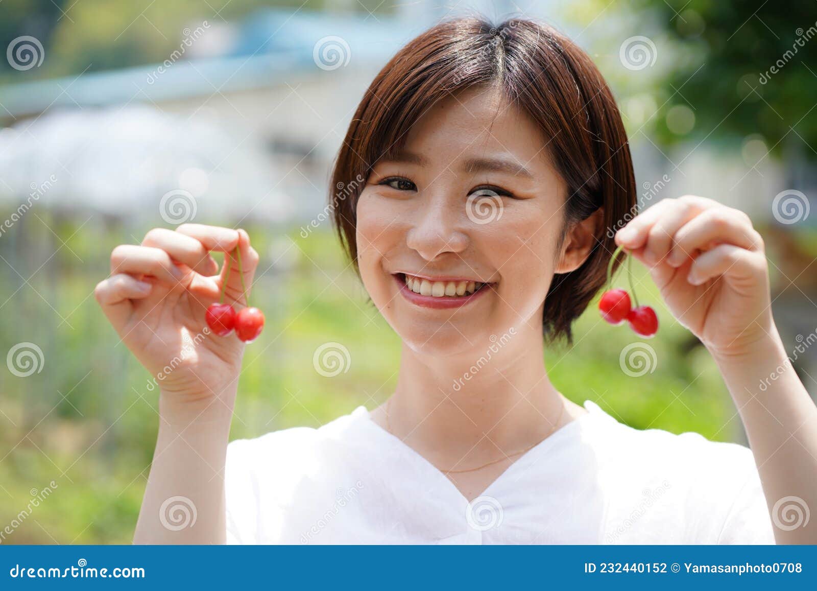 Image of a Woman with Cherries Stock Photo - Image of field, portrait ...