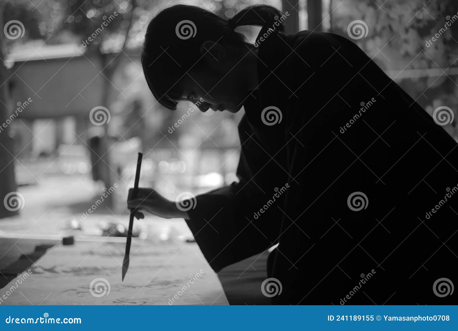 Female doing calligraphy stock image. Image of practice - 241189155