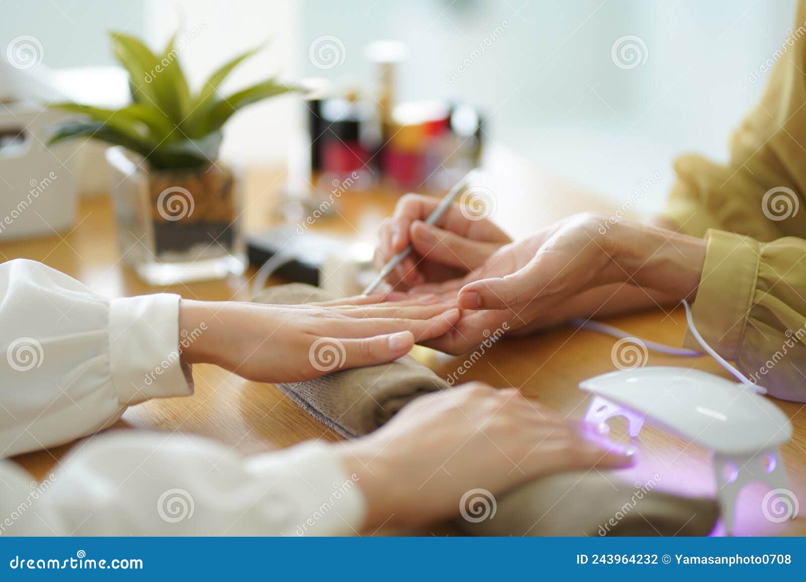 A Woman Nailing at a Nail Salon Stock Photo - Image of eating, child ...