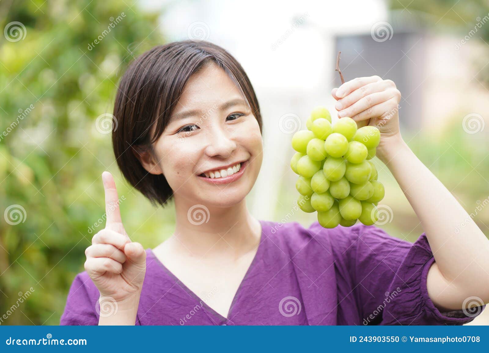 Woman with grapes stock photo. Image of food, meals - 243903550