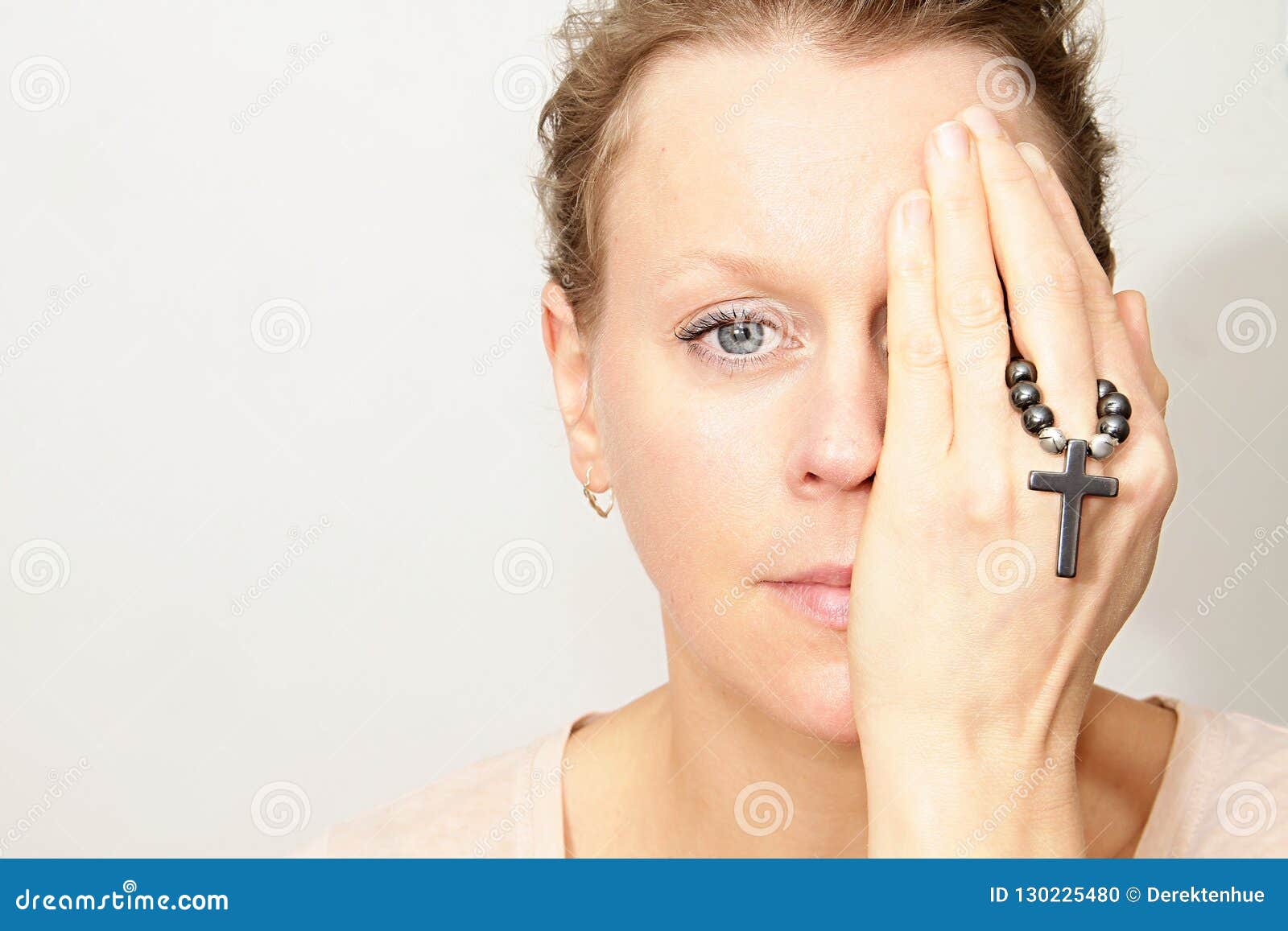 Woman Holding a Cross in Her Hands Stock Photo - Image of culture ...