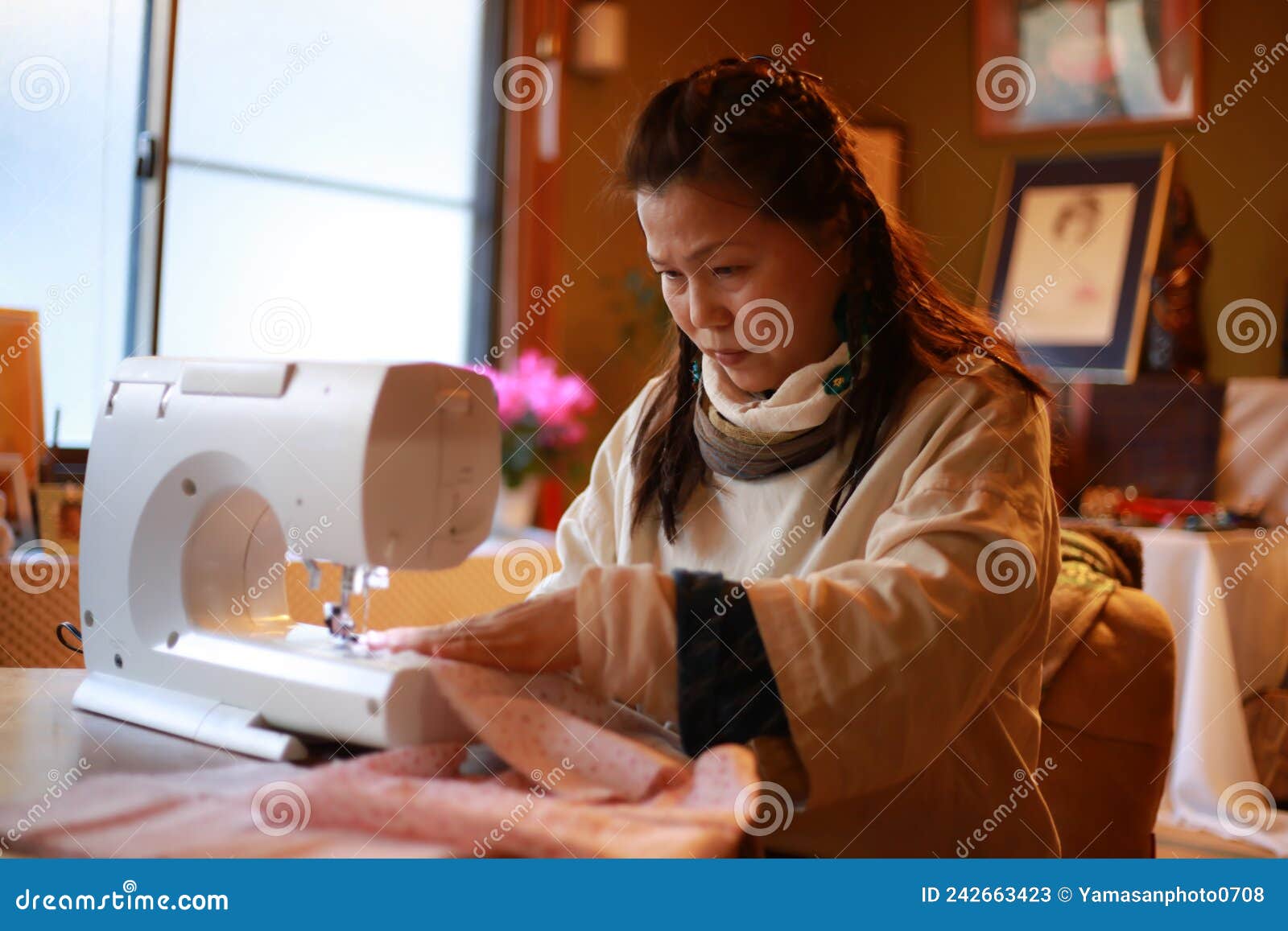 Woman Using a Sewing Machine Stock Image - Image of bright, clothes ...