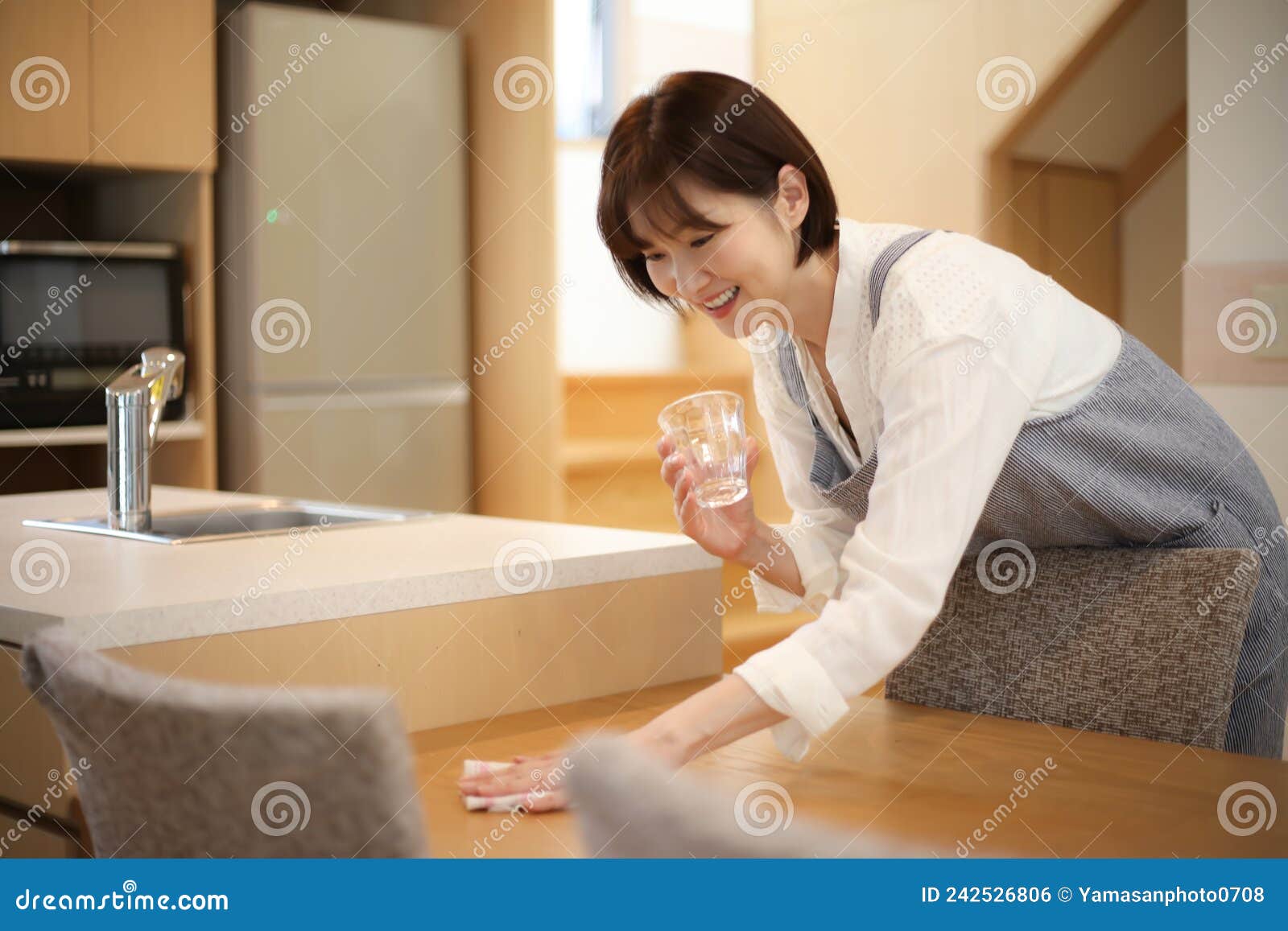 Woman wiping the table stock photo. Image of asia, body - 242526806