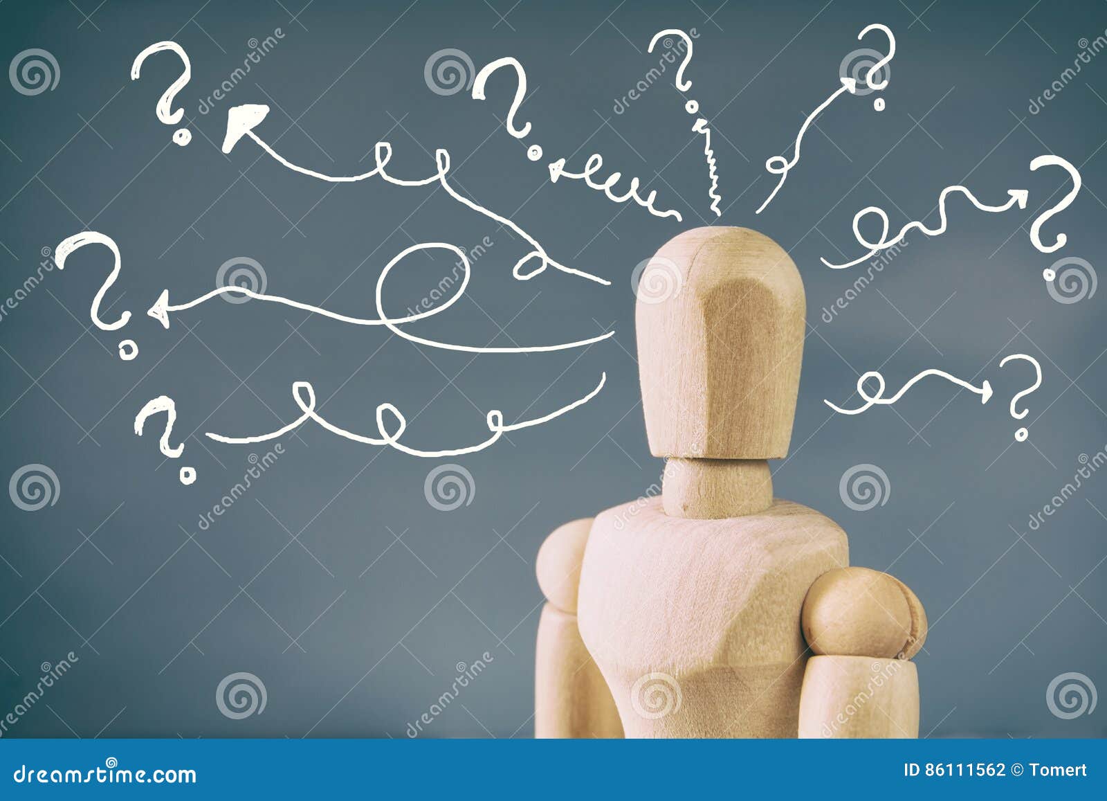 Image of Wooden Dummy with May Question Marks Stock Photo - Image of ...