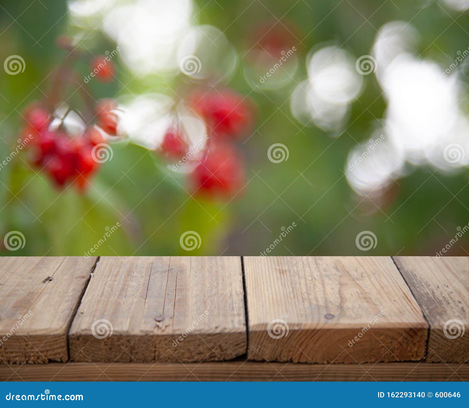 .image of Wooden Table in Front of Abstract Blurred Background of Stock ...