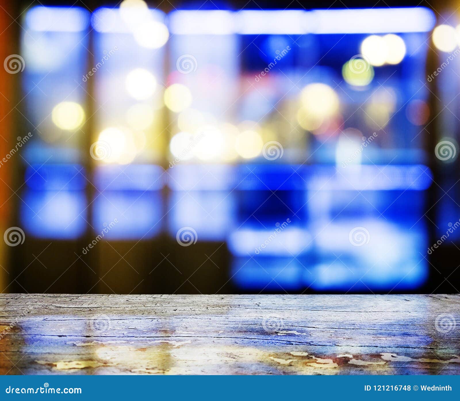 Image of Wooden Table in Front of Abstract Blurred Background Stock ...