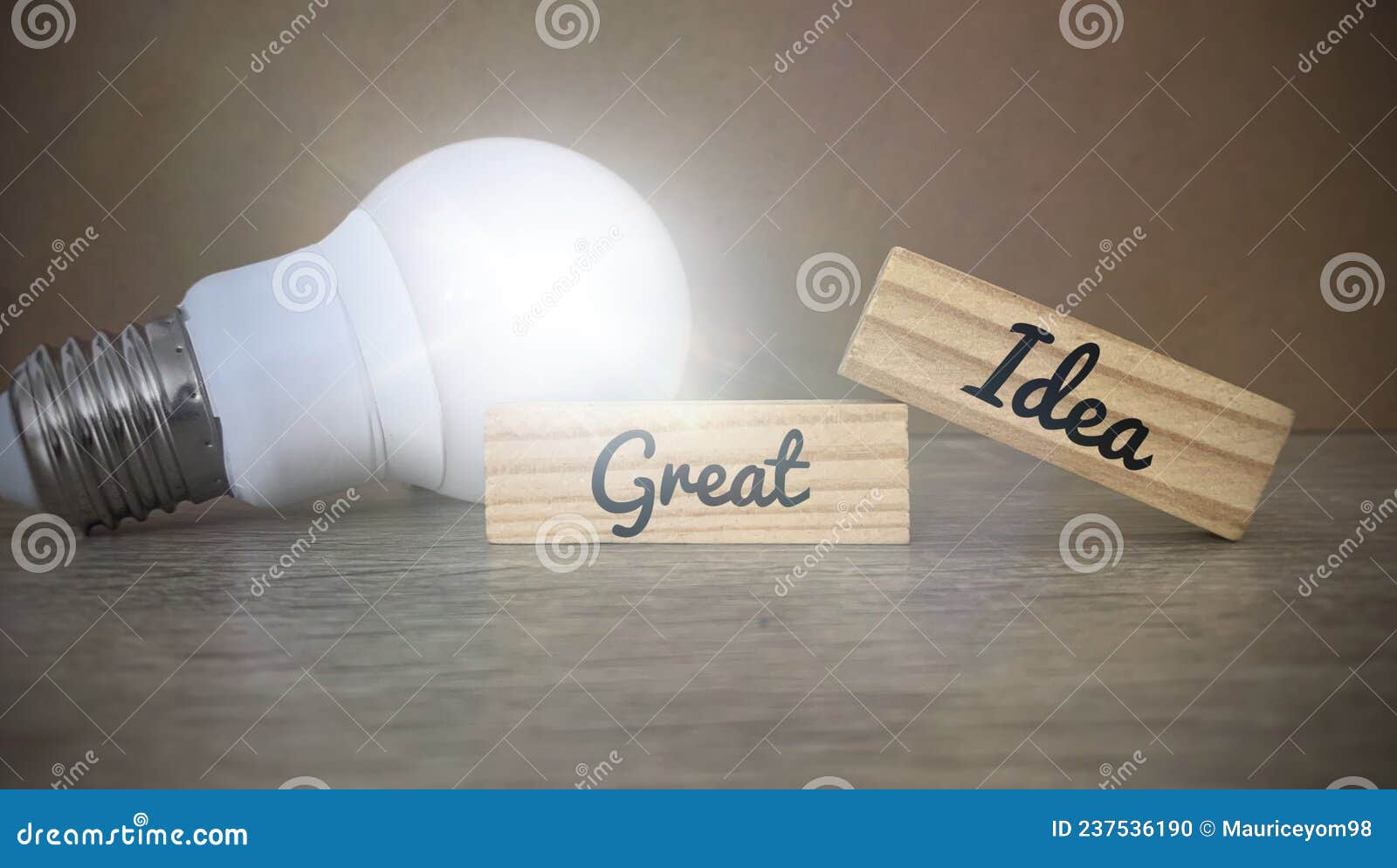 Image with Words Great Idea on Wooden Blocks with Shinning Light Bulb ...