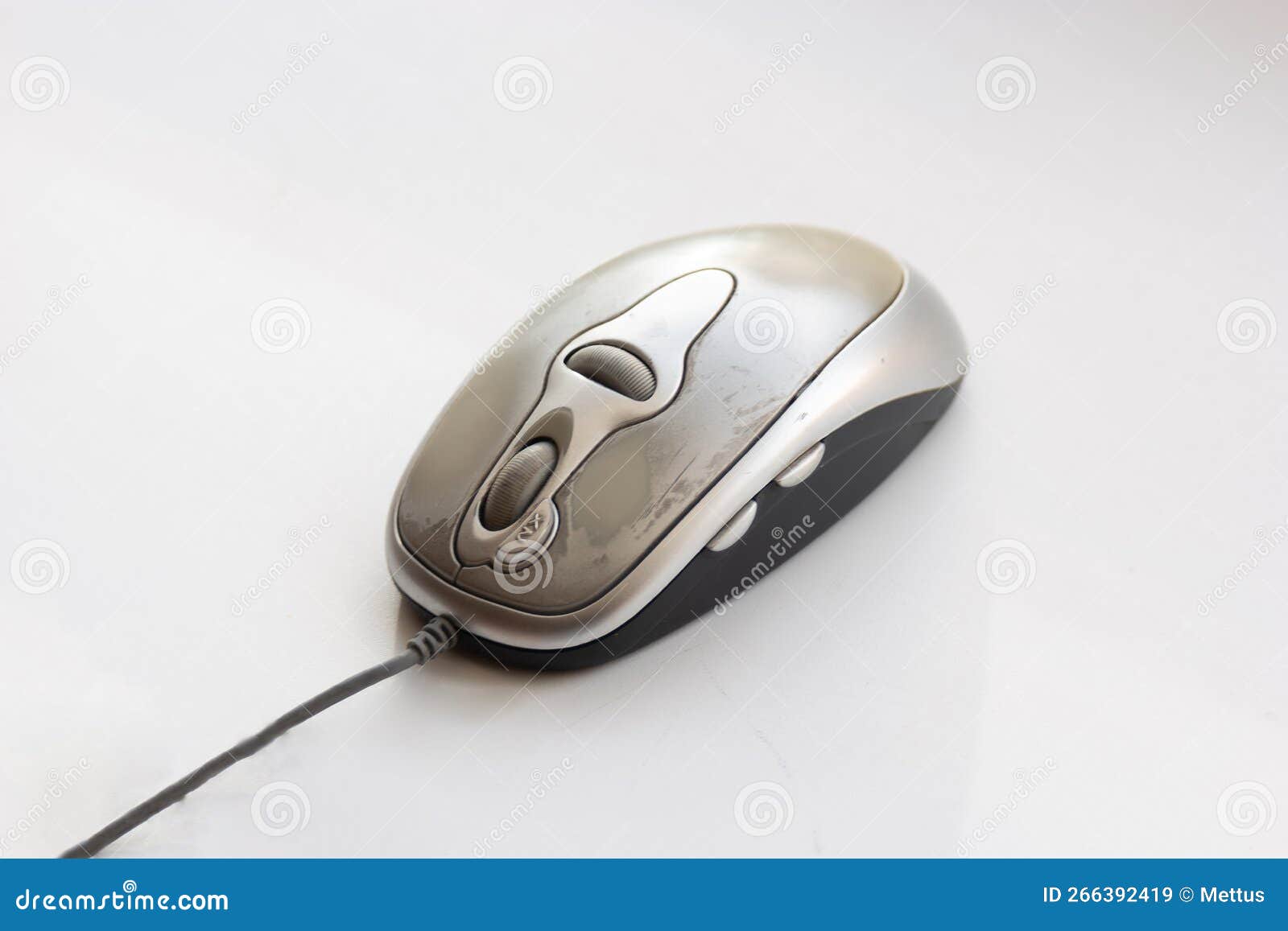 Worn and Well-used Computer Mouse, Bearing the Marks of Prolonged Usage ...