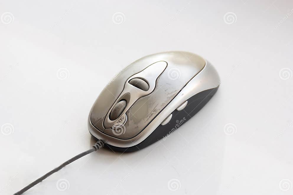 Worn and Well-used Computer Mouse, Bearing the Marks of Prolonged Usage ...