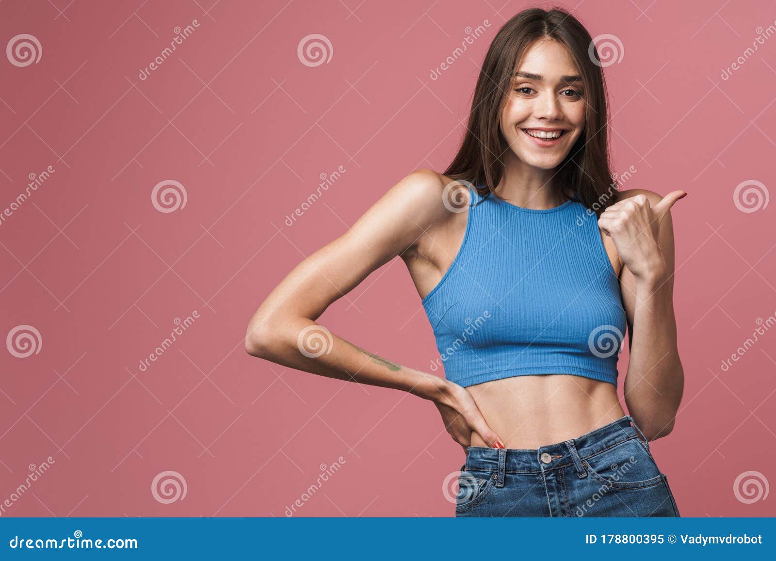 Image Of Young Brunette Woman Smiling And Pointing Finger Aside Stock