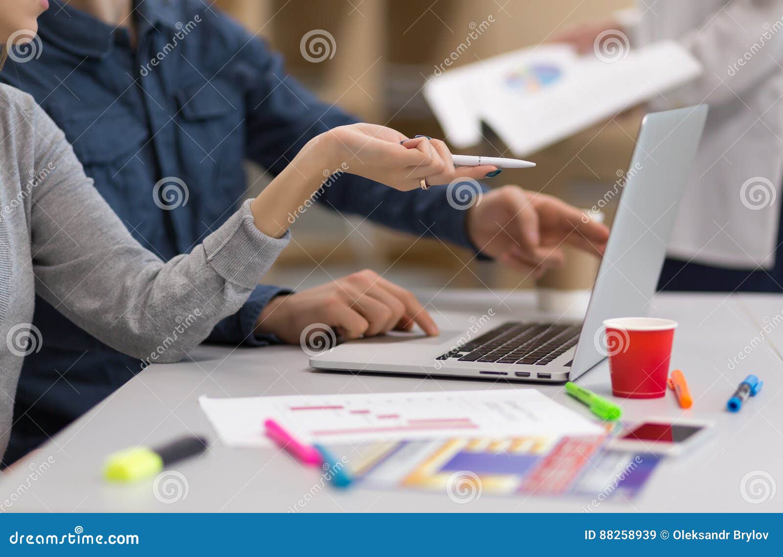Image of Young Business Team Discussing Project at Computer Stock Image ...