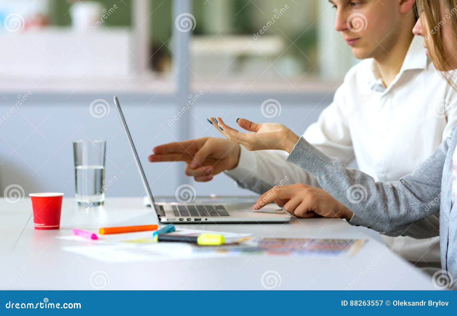 Image of Young Business Team Discussing Project at Computer Stock Image ...