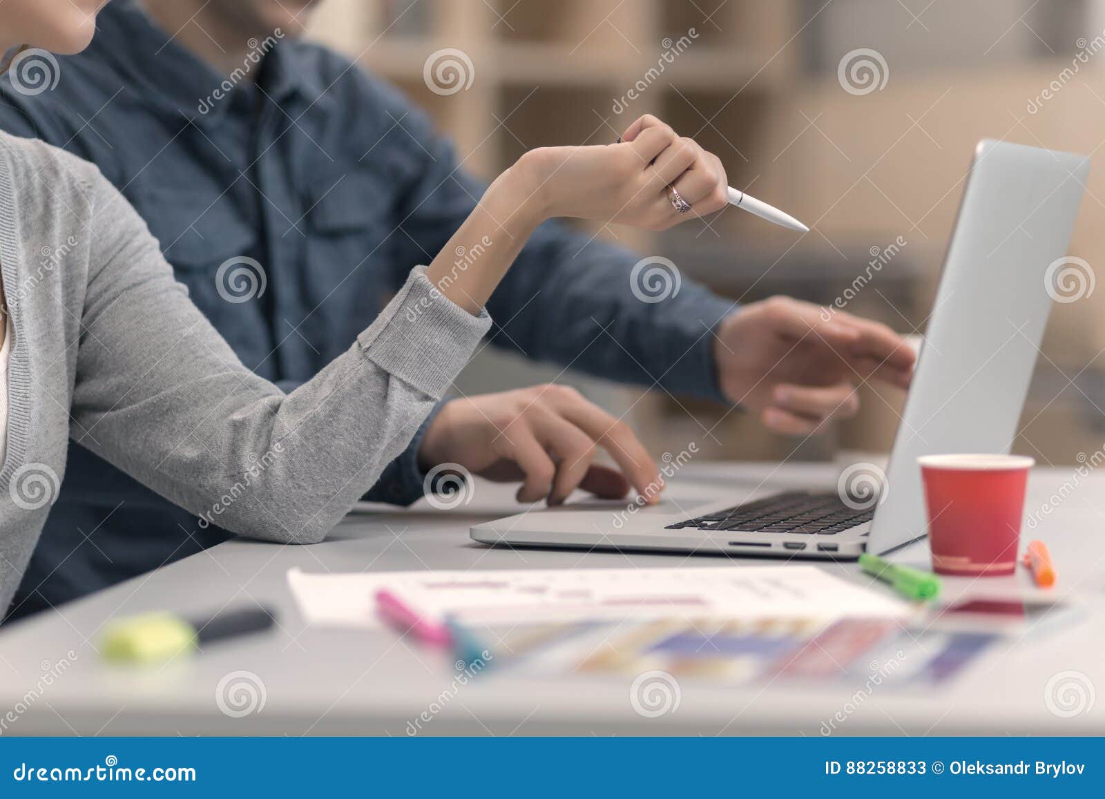 Image of Young Business Team Discussing Project at Computer Stock Image ...