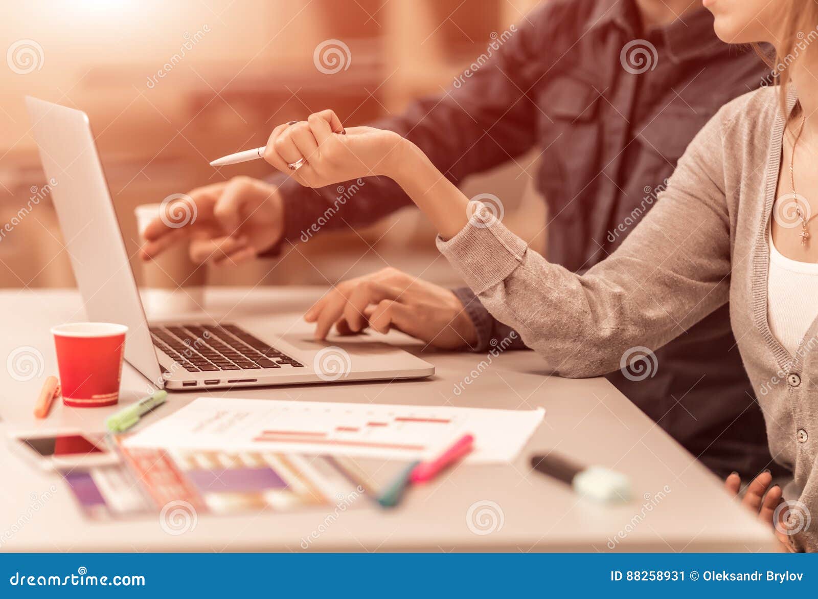 Image of Young Business Team Discussing Project at Computer Stock Image ...